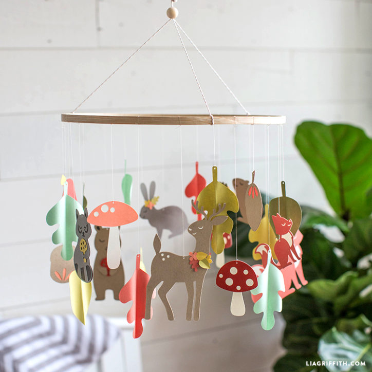 Create a simple papercut woodland baby mobile
