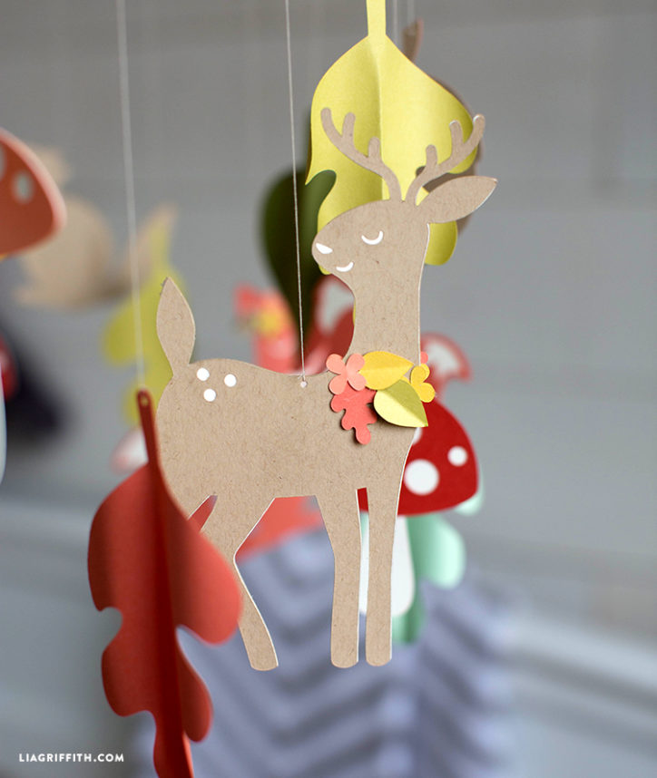 Create a simple papercut woodland baby mobile