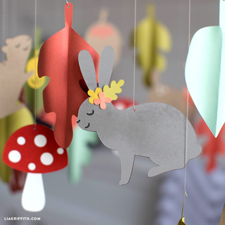 Create a simple papercut woodland baby mobile