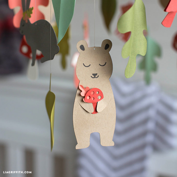 Create a simple papercut woodland baby mobile